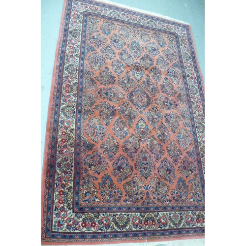 Middle Eastern deep pink and floral carpet with eight borders and multi ...