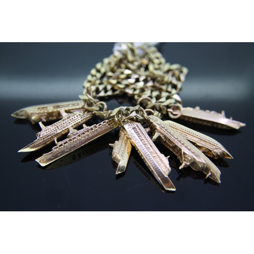 9ct gold flat link chain with eight 9 & 14ct gold cruise liner pendants ...