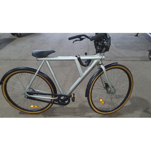 1 city bicycle by Vanmoof 3 speed and integral head light with a pull out security chain built into