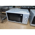 A silver microwave oven by Cookworks - trade