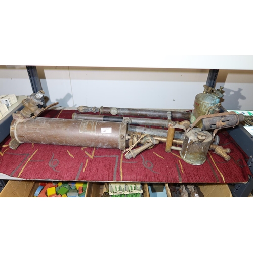 A quantity of various vintage brass and copper hand pumps and blow ...