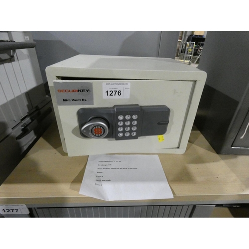 1 small keypad safe by Securikey - combination is currently set to C 1234