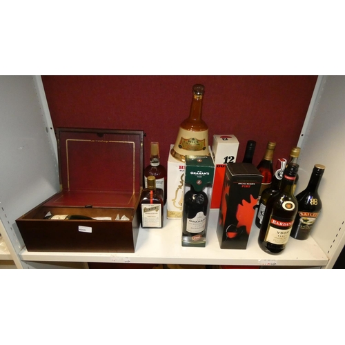 1 bottle of Remy Martin Cognac in a wooden writing box, 3 bottles of ...