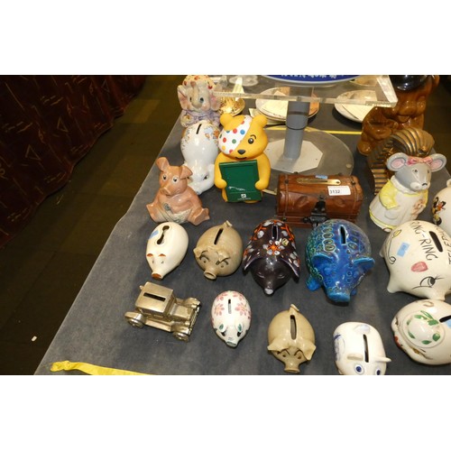 A collection of miscellaneous decorative money boxes