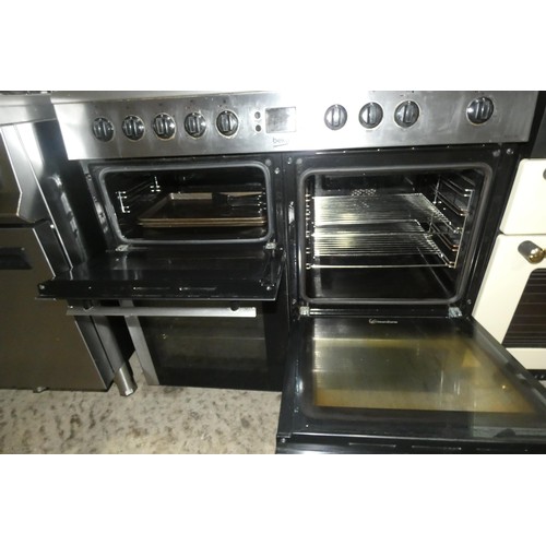 An electric 5 ring range with a hot plate, 2 ovens & grill below by ...