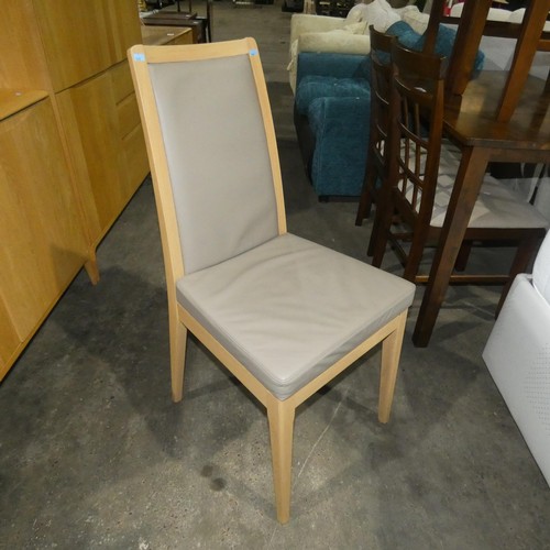 A set of four vintage Ercol light wood high back dining chairs with ...