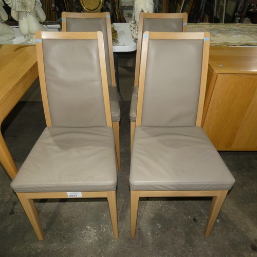 A set of four vintage Ercol light wood high back dining chairs with ...