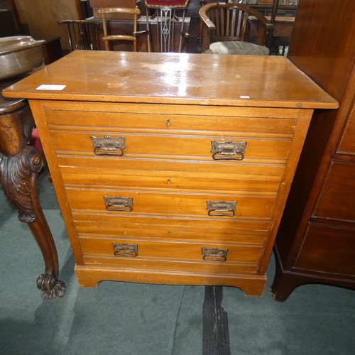An Edwardian satin walnut chest of drawers. measuring approx 84cm high ...
