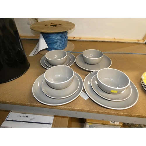 A 12 piece grey / white dinnerware set by Waterside