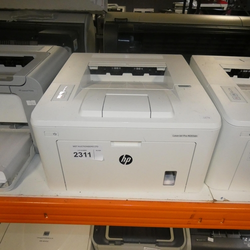 An office printer by HP type Laserjet pro M203dn - trade. Tested Working.