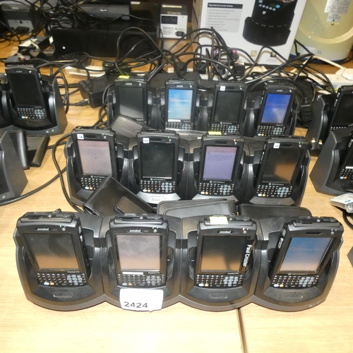 12 x Symbol MC50 pocket PCs with 3 x banks of 4 charging docks (12 ...