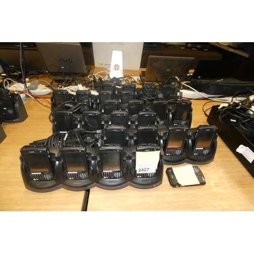 24 x Symbol MC50 pocket PCs with 6 x banks of 4 charging docks (12 ...