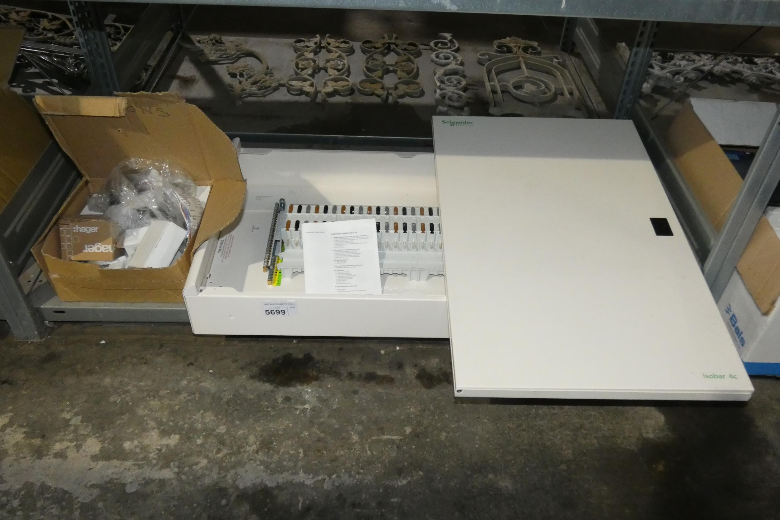 A Schneider Isobar 4C distribution board and 1 box containing a ...