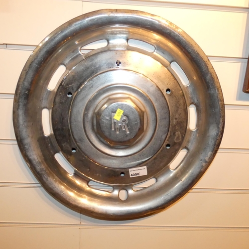 A vintage Rolls-Royce hubcap