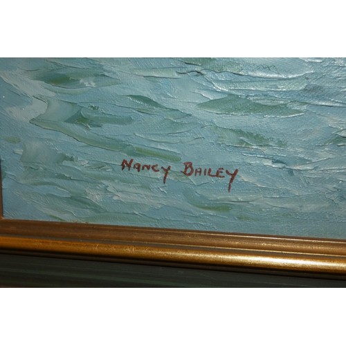 An oil on canvas in a gilt frame, subject; a Cornish coastal scene ...