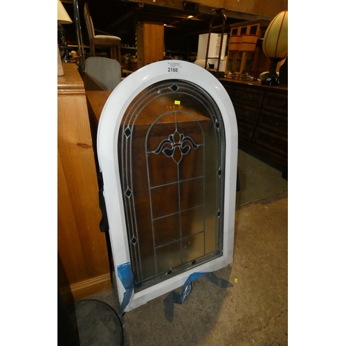 A UPVC double glazed curved top window unit (non opening) approx 59cm w ...