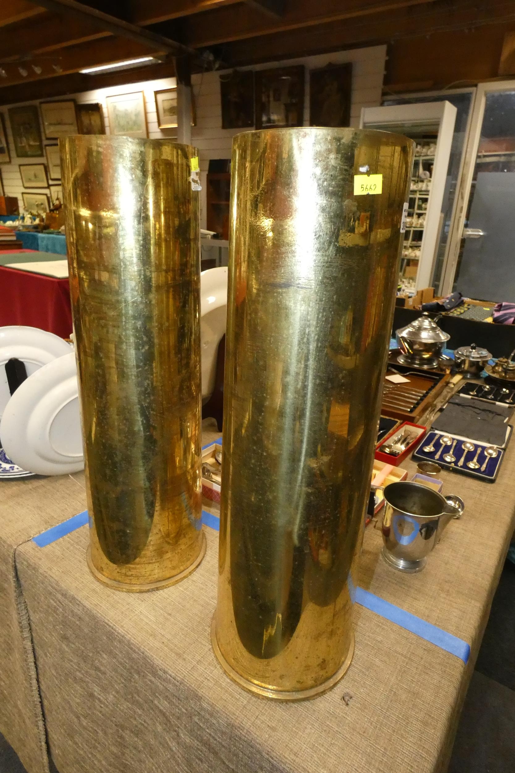 Two large vintage brass shell cases