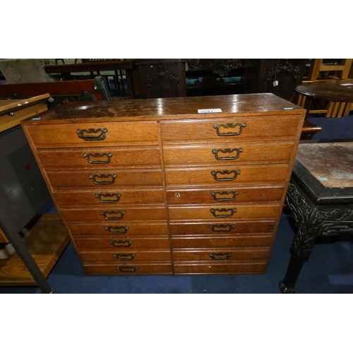 A small vintage Oak multi drawer chest of 18 drawers approximately 78 ...