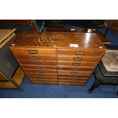 A small vintage Oak multi drawer chest of 18 drawers approximately 78 ...