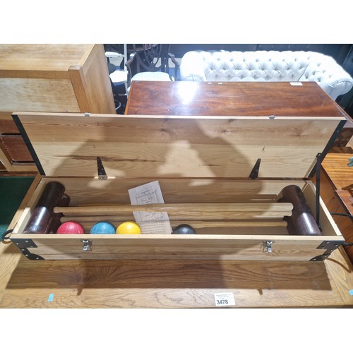 A Townsend croquet set in a wooden box, with 6 hoops, 4 mallets and ...