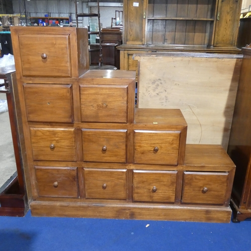 A vintage stepped cabinet of 10 small drawers, overall width ...