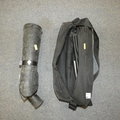 An Optus spotting scope with tripod & carry case