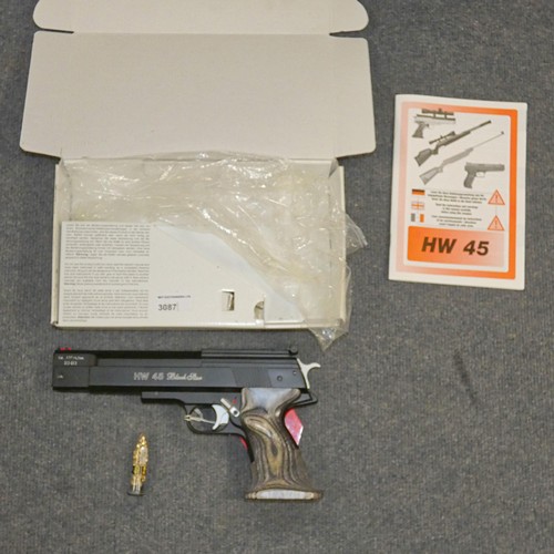 A boxed HW 45 .177 Black Star air pistol. Only for sale to persons over ...