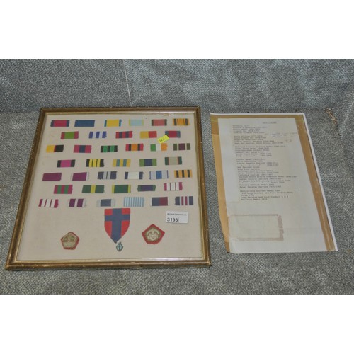 A collection of framed and mounted military award ribbons