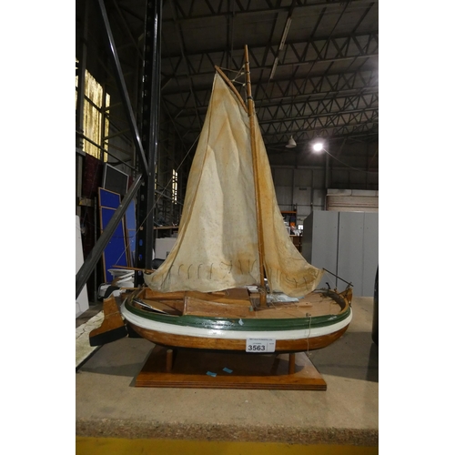 A wooden model of a Thames barge