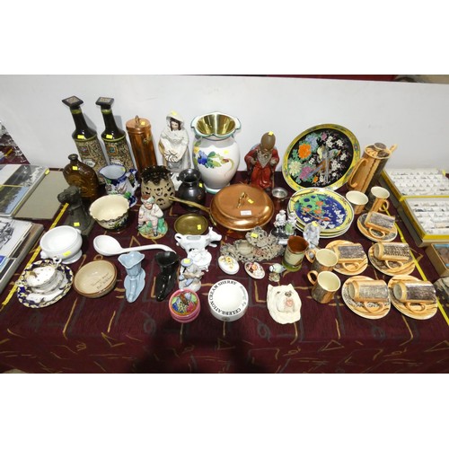 Two tall ceramic gin and whisky bottles, a large copper frying pan, a ...