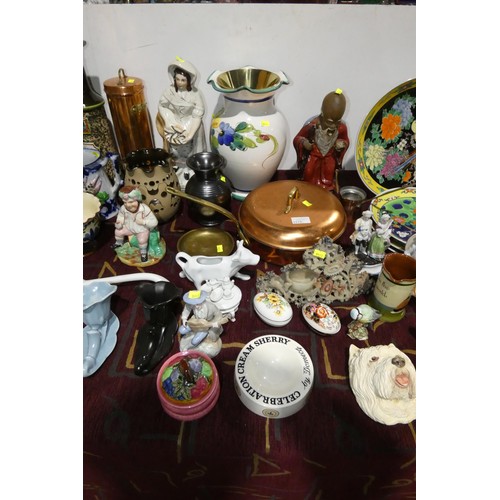 Two tall ceramic gin and whisky bottles, a large copper frying pan, a ...