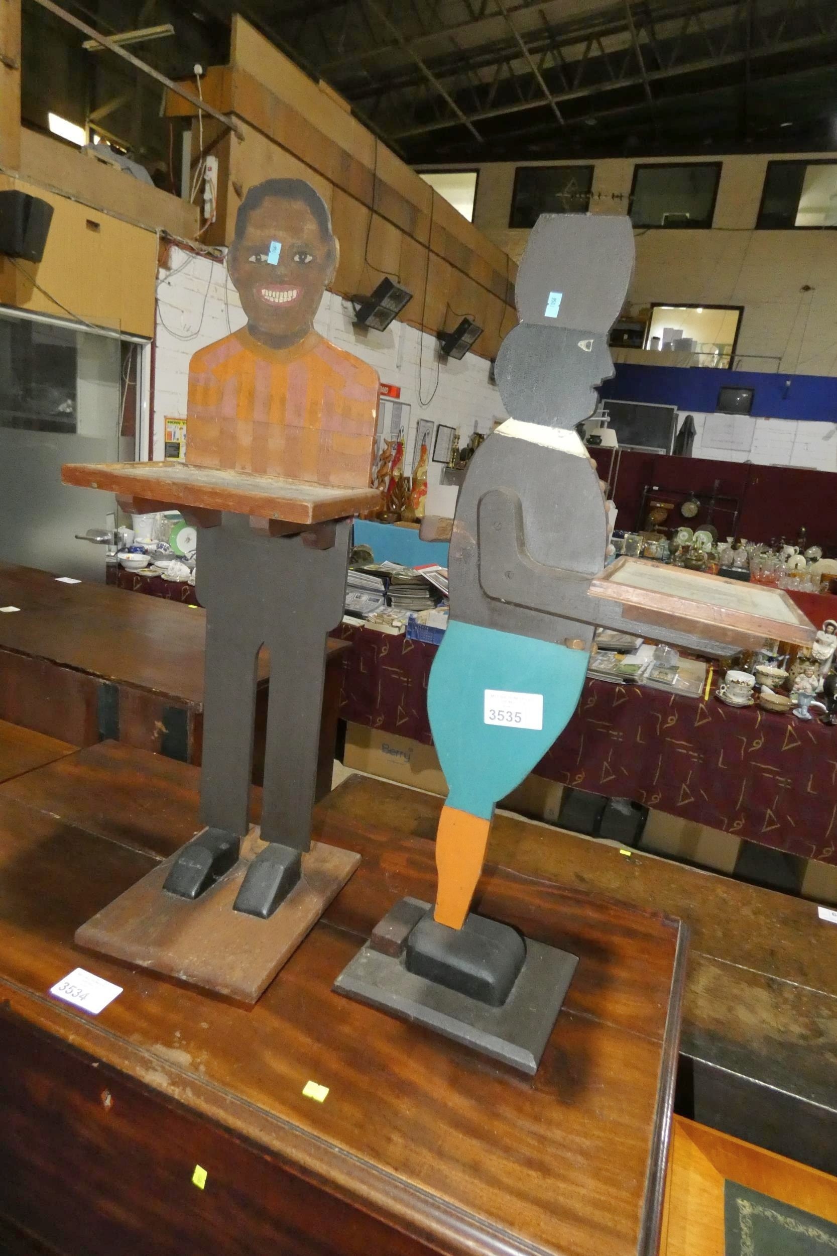 Two tall wooden dumb waiters