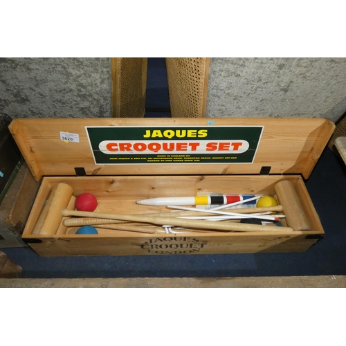 A vintage croquet set in a wooden box