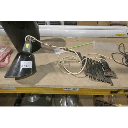 A vintage retractable telescopic wall mounted inspection lamp