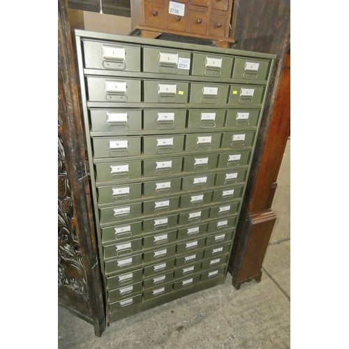 A vintage enamel 52 drawer floor standing index cabinet, approximately ...