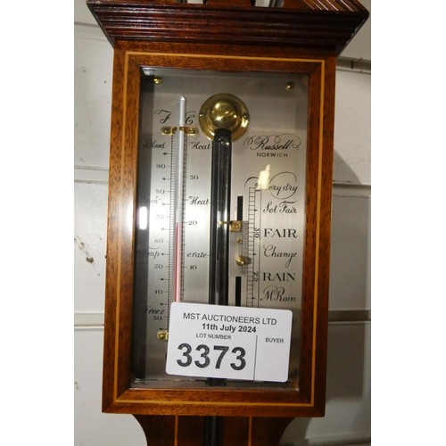An inlaid mahogany stick barometer with Mercury tube