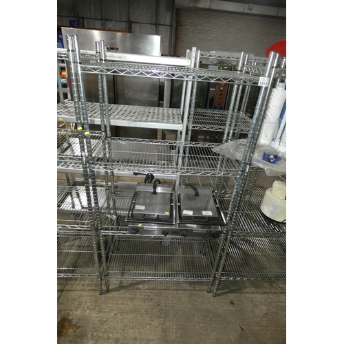 A catering type rack by Vogue with 4 shelves approx 90x47x186cm