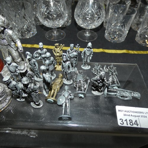 A collection of miniature white metal figurines of tradesmen and other ...