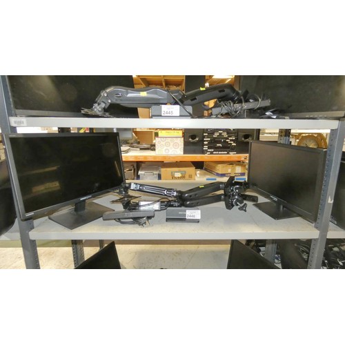 An office desk set-up including a laptop port replicator by HP, 2 x 22 ...