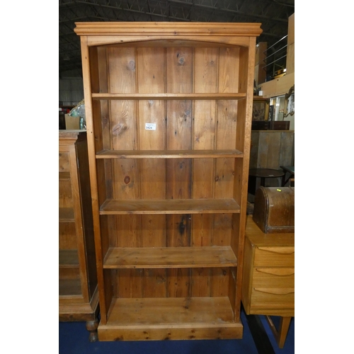 A tall vintage pine open fronted floor standing bookcase with five ...