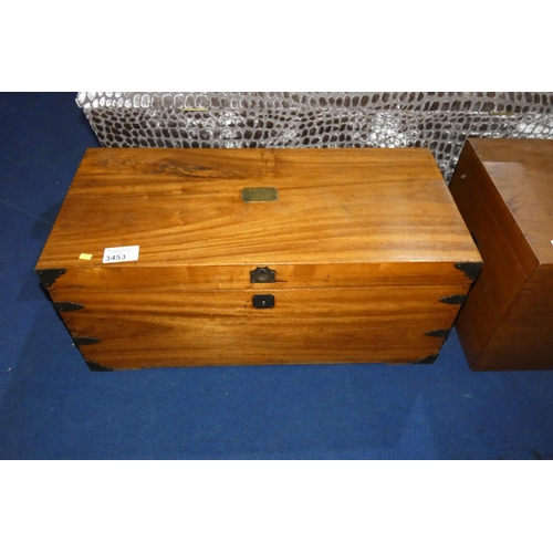 A vintage mahogany storage box with a lift lid and side handles