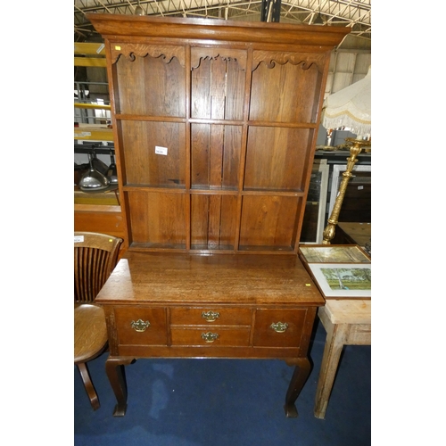 A vintage Oak dresser with open shelves above, two shallow drawers ...