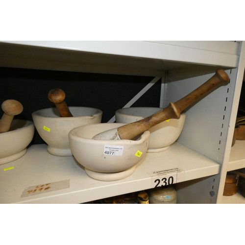 7 large heavy duty vintage laboratory mortars and pestles (1 shelf)