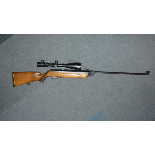 A Weihrauch HW35 .22 air rifle with telescopic sight.