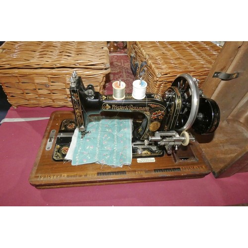 2 x vintage Frister and Rossman hand sewing machines both in wooden ...