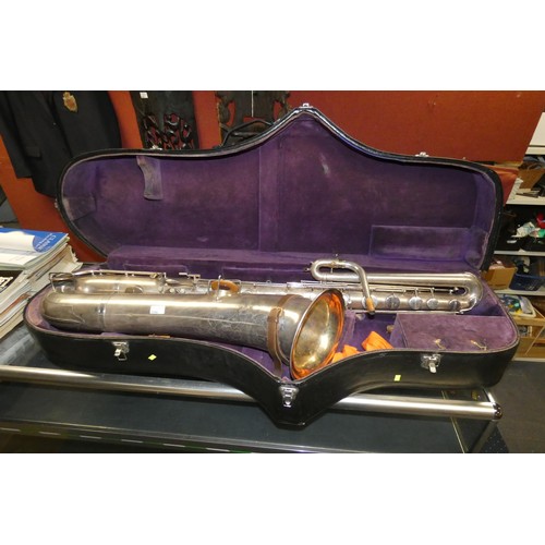A 1920s vintage Buescher Elkhart base saxophone with carry case