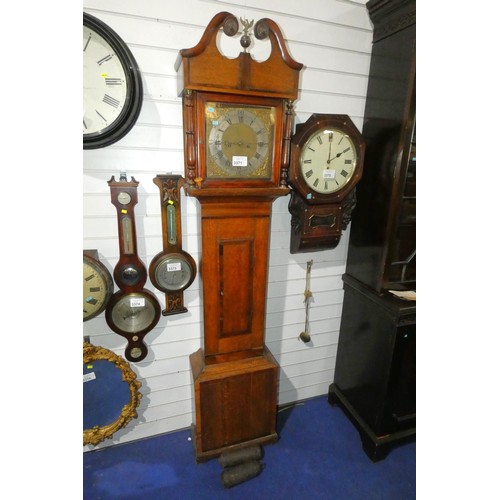 A country style Oak case grandfather clock with swan neck cresting, a ...