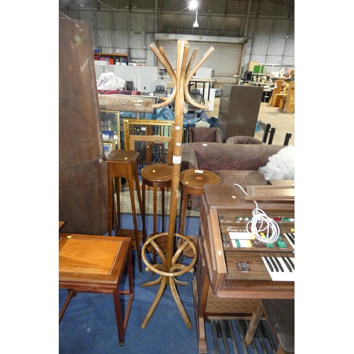 A bentwood pylon hat and coat stand