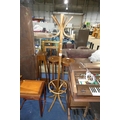 A bentwood pylon hat and coat stand