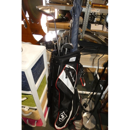 1 x Wilson golf caddy bag containing a quantity of various golf clubs